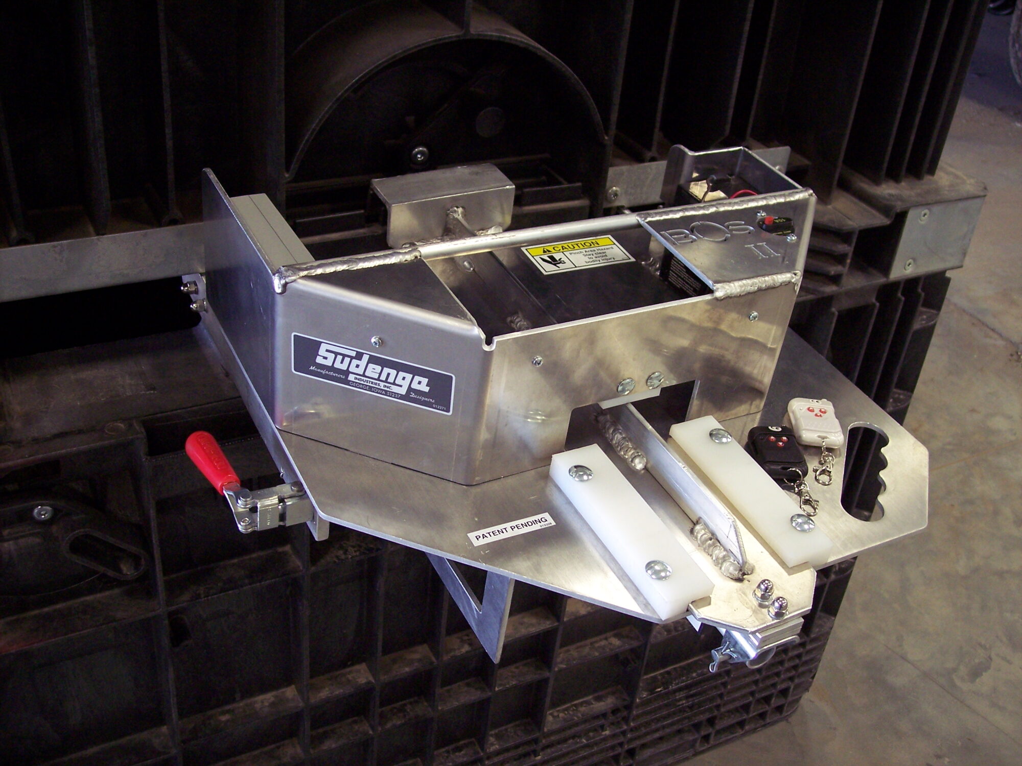 Open bulk seed boxes with a push of a button - Sudenga Industries Inc.