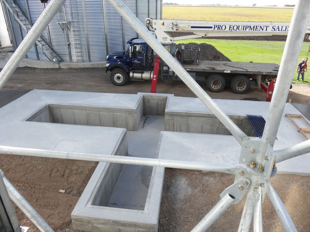 Shallow Double Drive Over (SDDO) receiving pit - Sudenga Industries Inc.